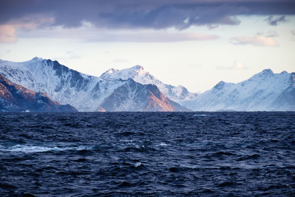 Ocean and mountain ridge at the morning time. Beautiful natural ...